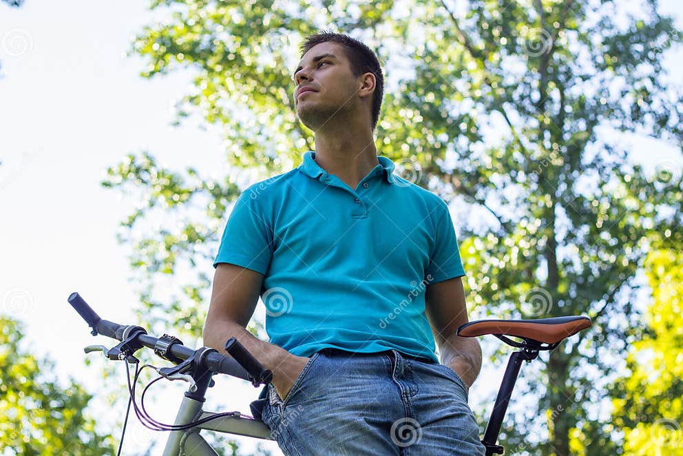 Portrait of a Young Cyclist Taking a Break Stock Photo - Image of male ...