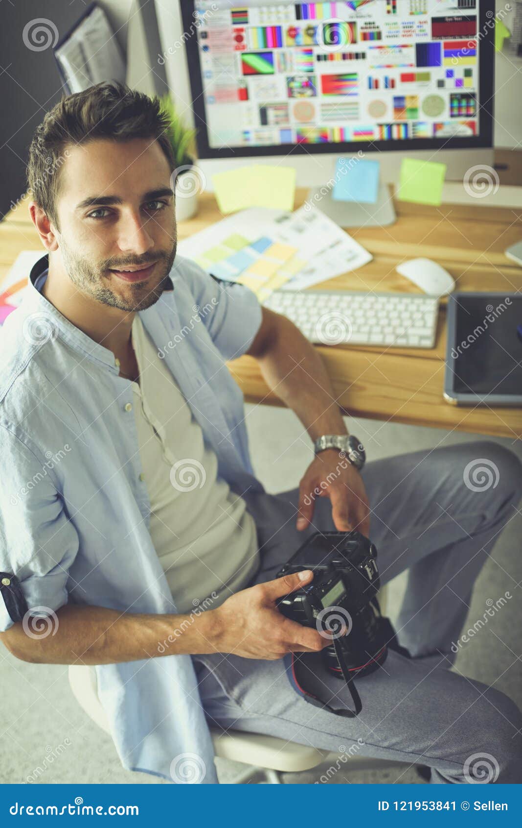 Portrait of Young Designer Sitting at Graphic Studio in Front of Laptop ...