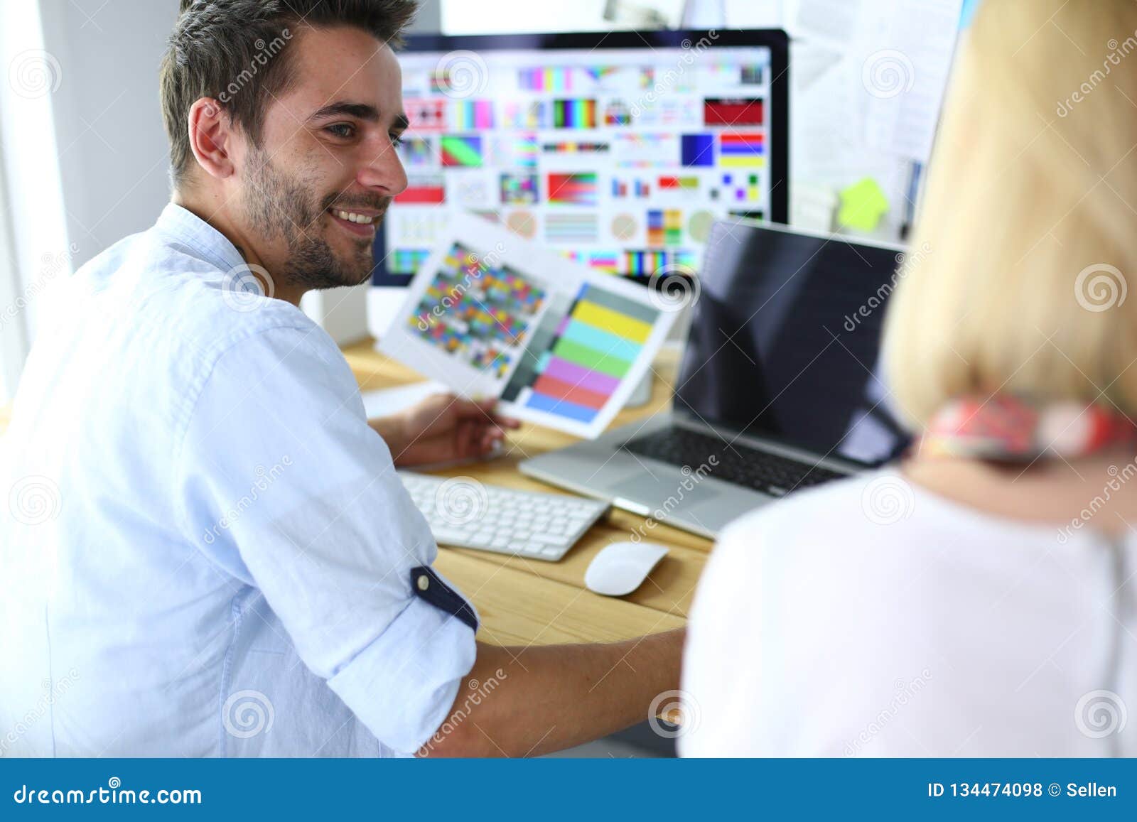 Portrait of Young Designer Sitting at Graphic Studio in Front of Laptop ...