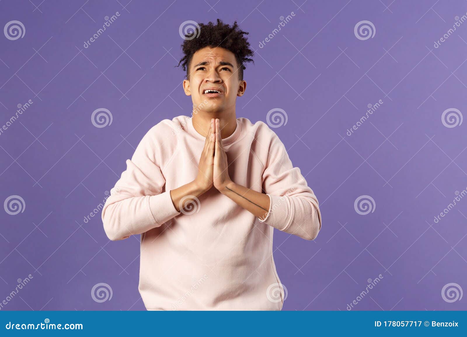 Portrait of Young Distressed and Devestated Hispanic Guy Pleading To ...
