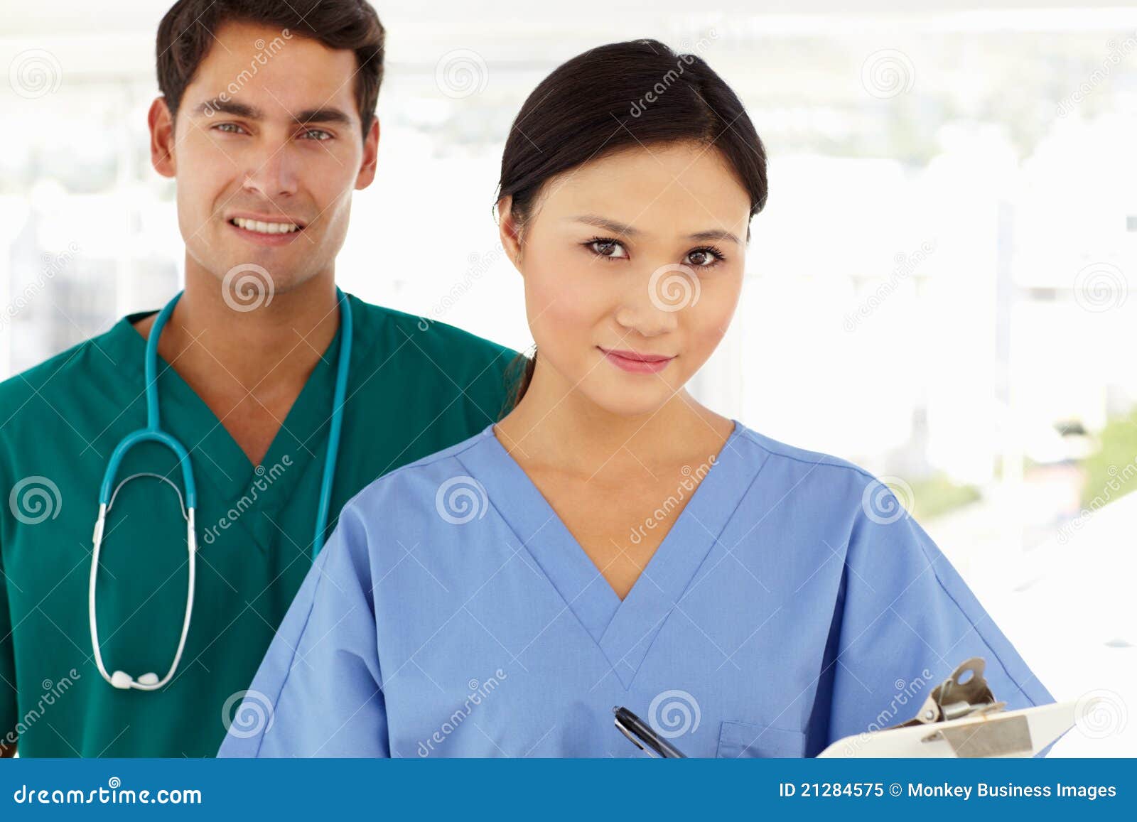 Young Doctors And Medical Students Train With Instruments And Plastic ...