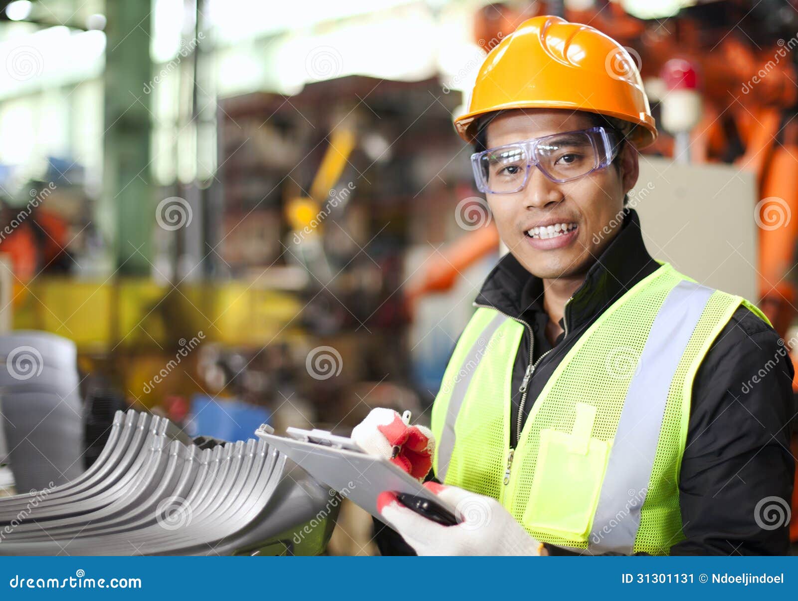 Portrait of Young Engineer Taking Notes Stock Image - Image of ...