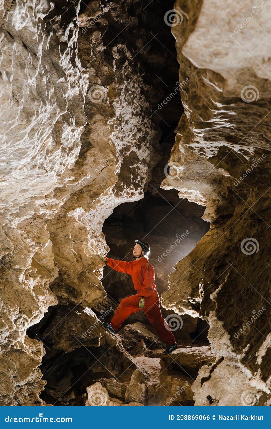 A Portrait of a Young Female Caver Exploring the Cave Stock Photo ...