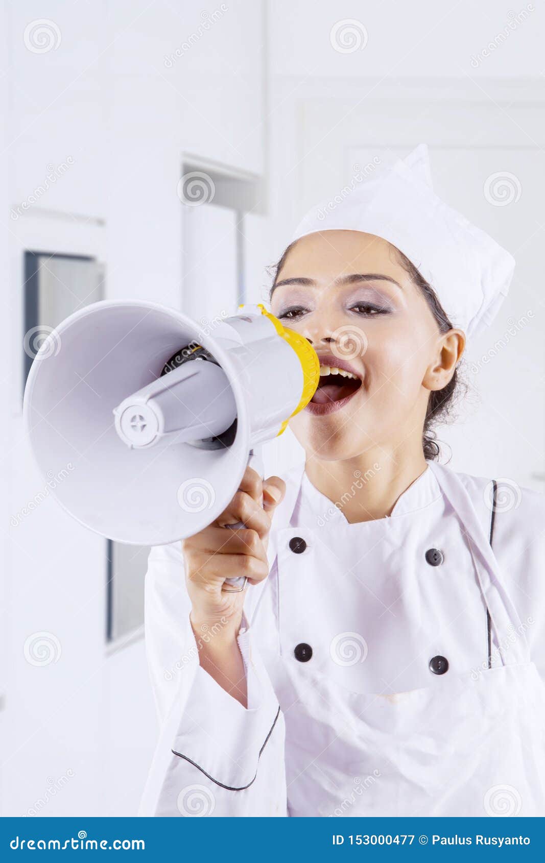 Female Chef Using a Megaphone in the Kitchen Stock Image - Image of ...