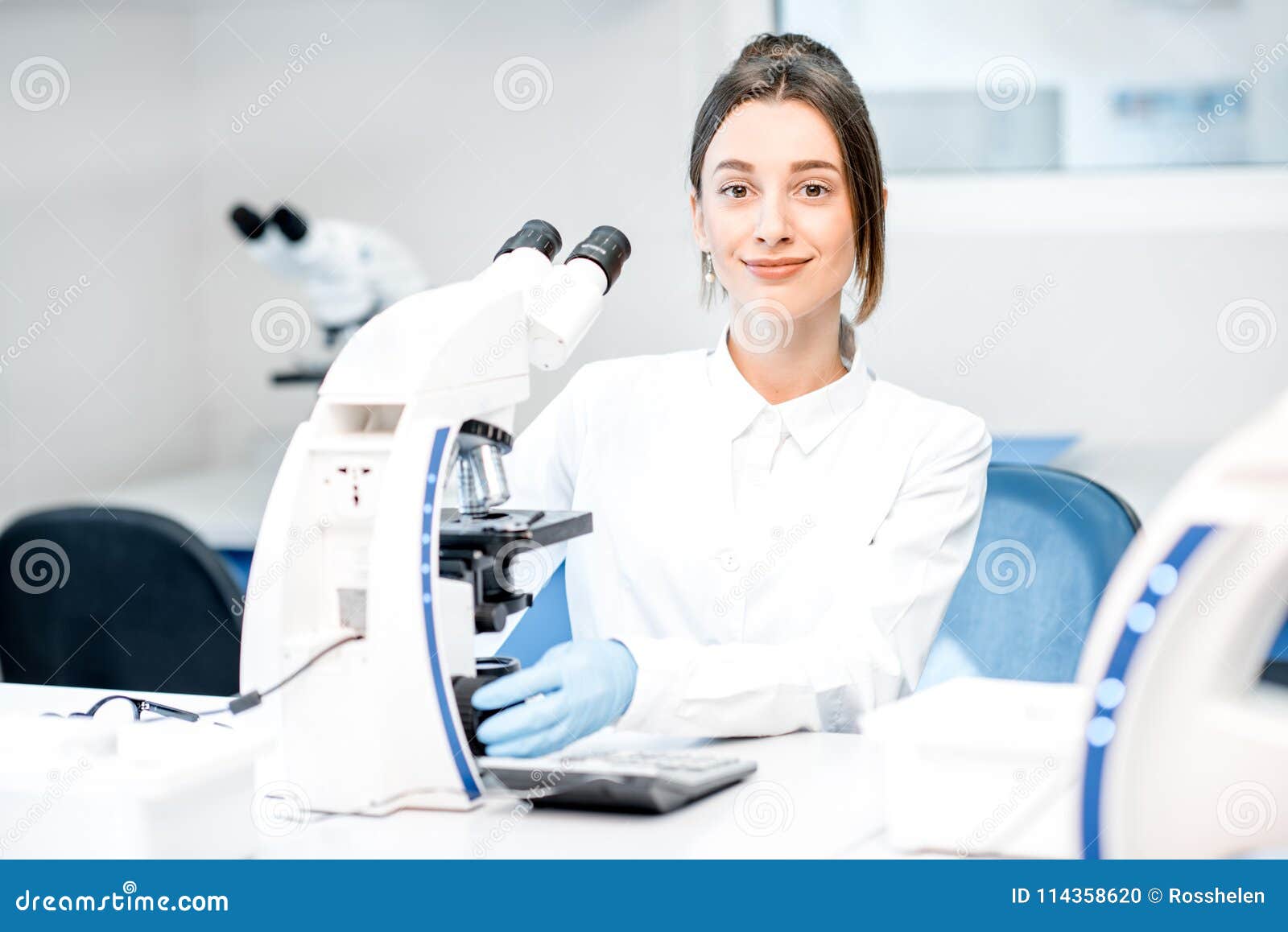 Medic Working with Microscope at the Laboratory Stock Photo - Image of ...