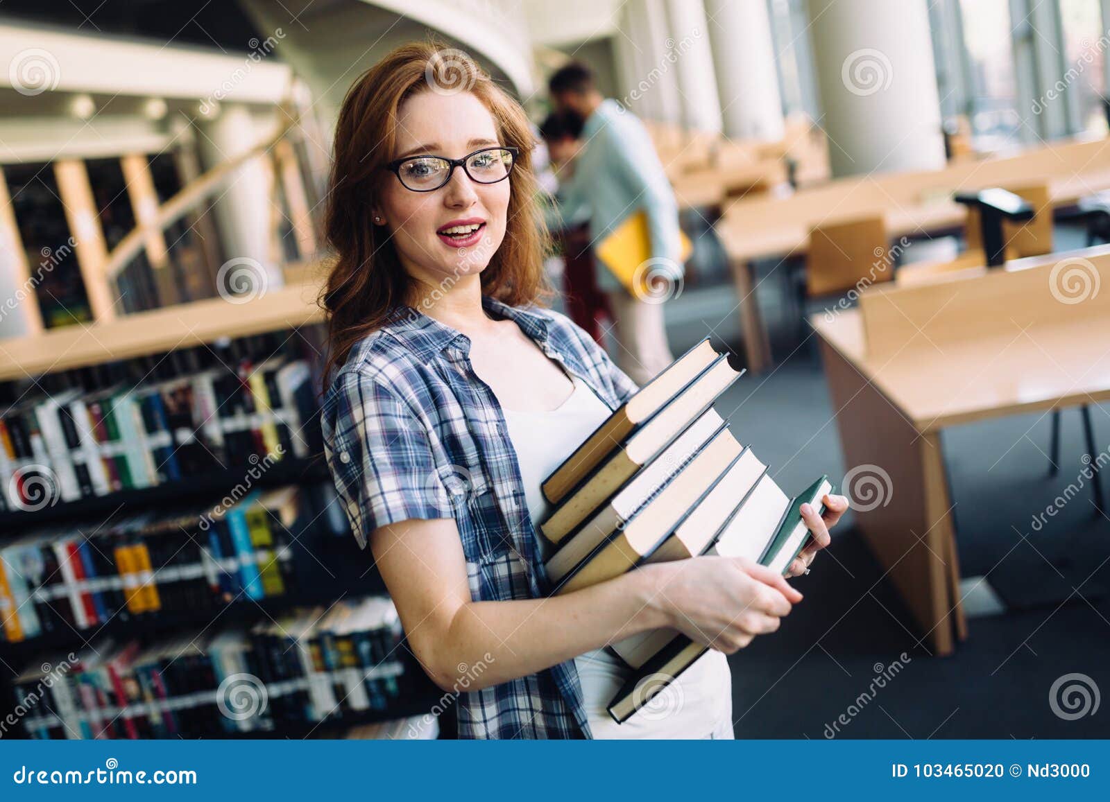 Portrait of Young Female Student in Library Stock Photo - Image of ...