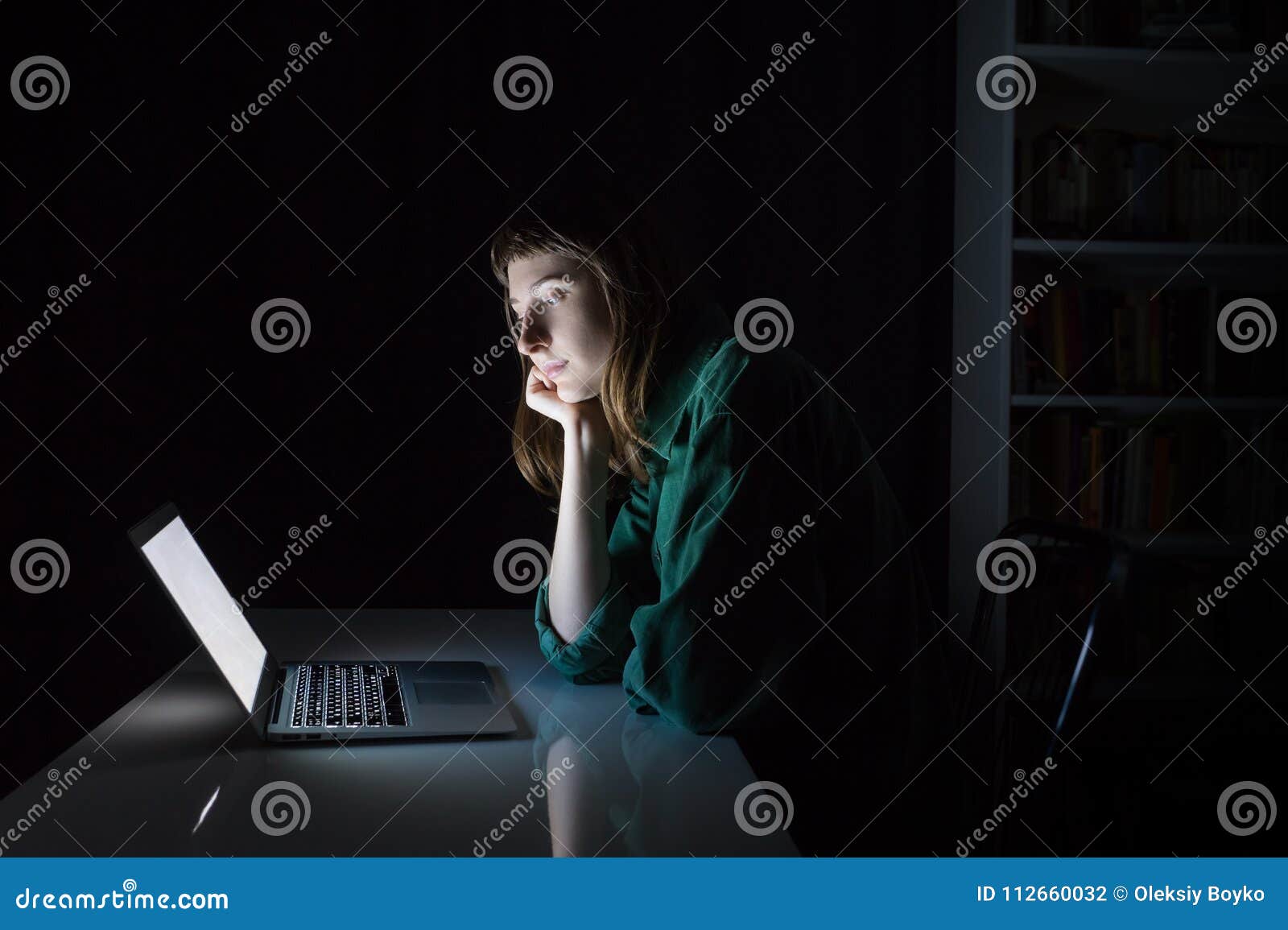 Woman at Laptop Computer Late in the Evening Bored or Reading Stock ...