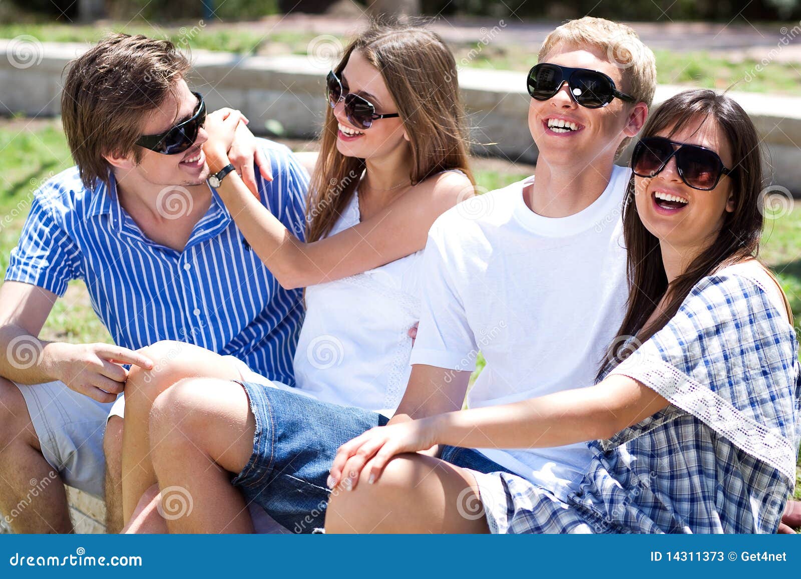 Portrait of a Young Group Laughing Stock Image - Image of sitting ...