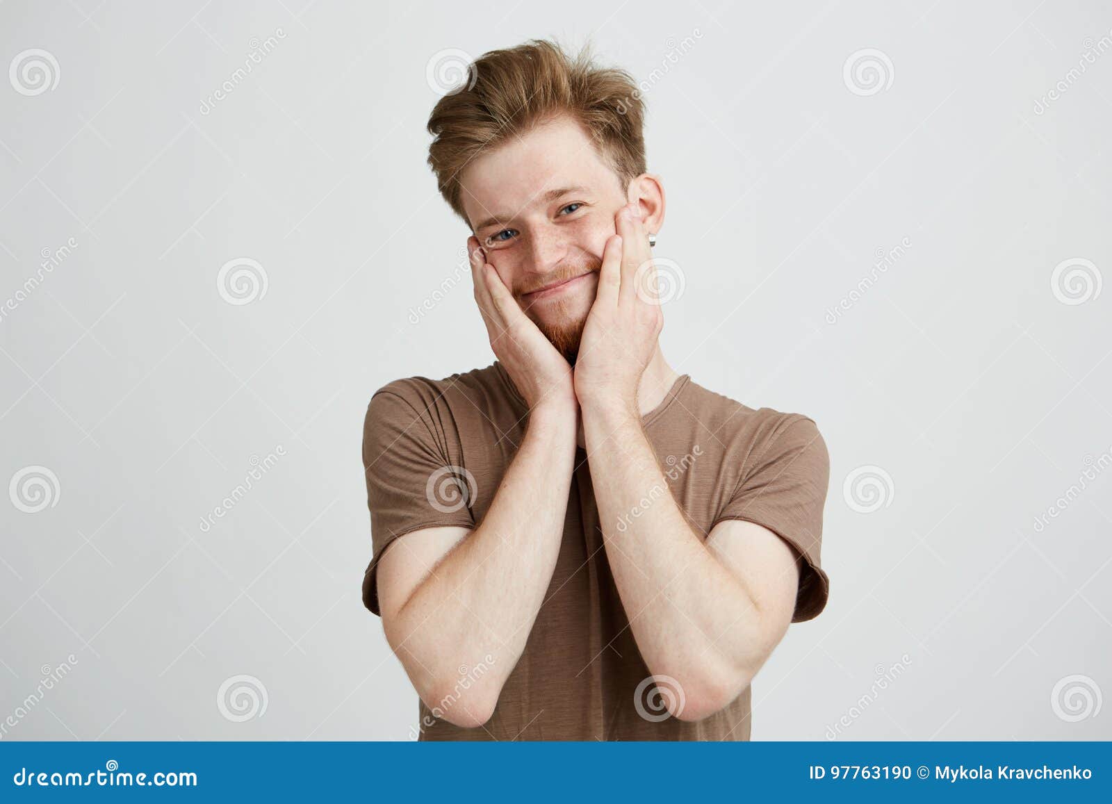 Portrait Of Young Handsome Cute Man Smiling Looking At Camera With