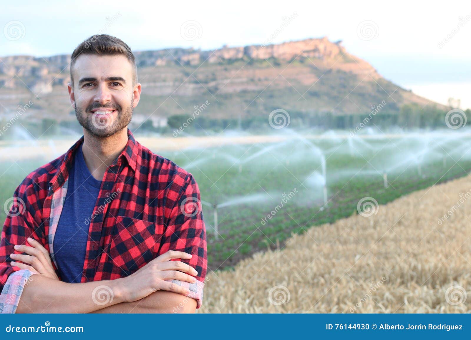Portrait of Young Handsome Farmer Smiling on Farmland Stock Photo ...