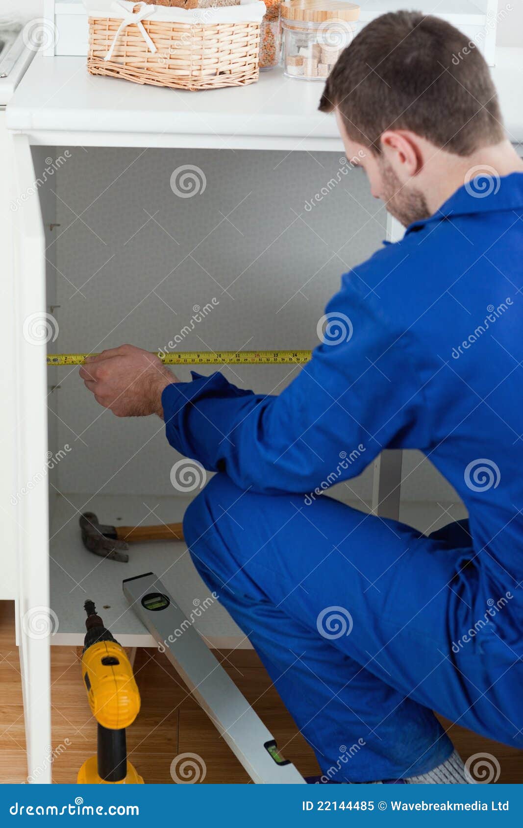 Portrait of a Young Handyman Measuring Something Stock Image - Image of ...