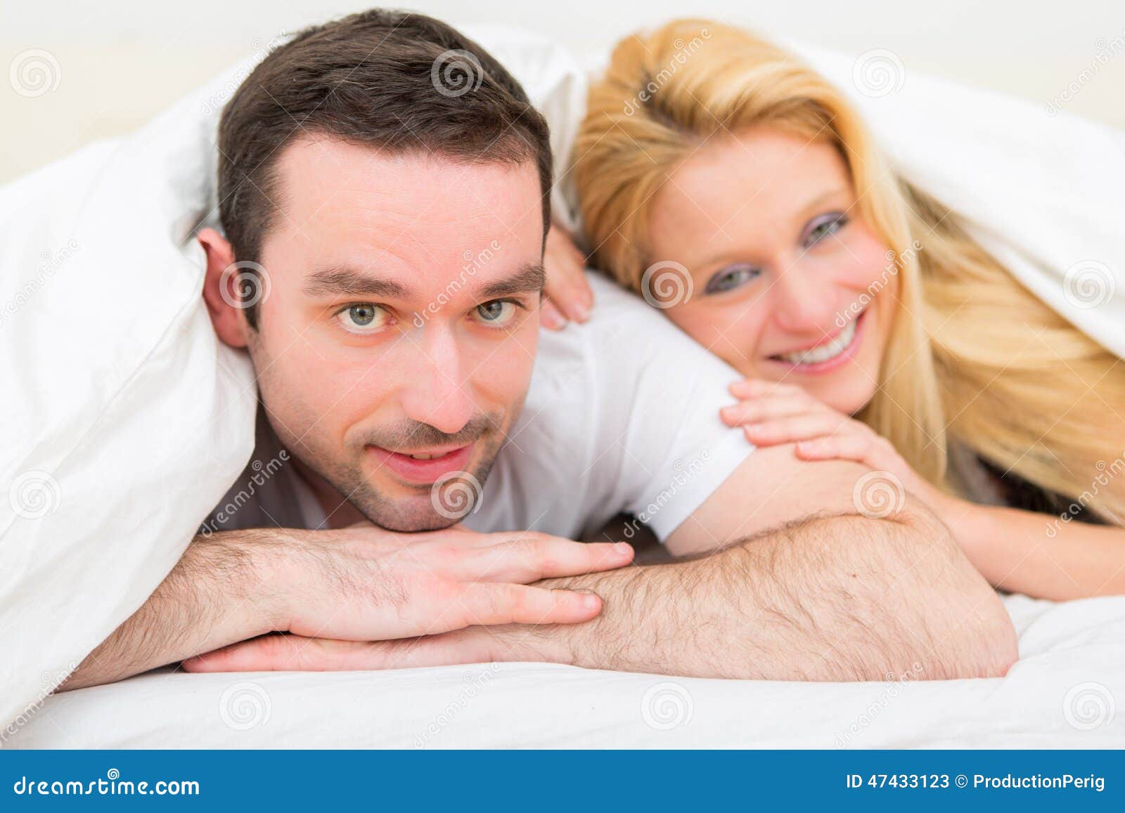 Portrait of a Young Happy Couple in a Bed Stock Image - Image of love ...