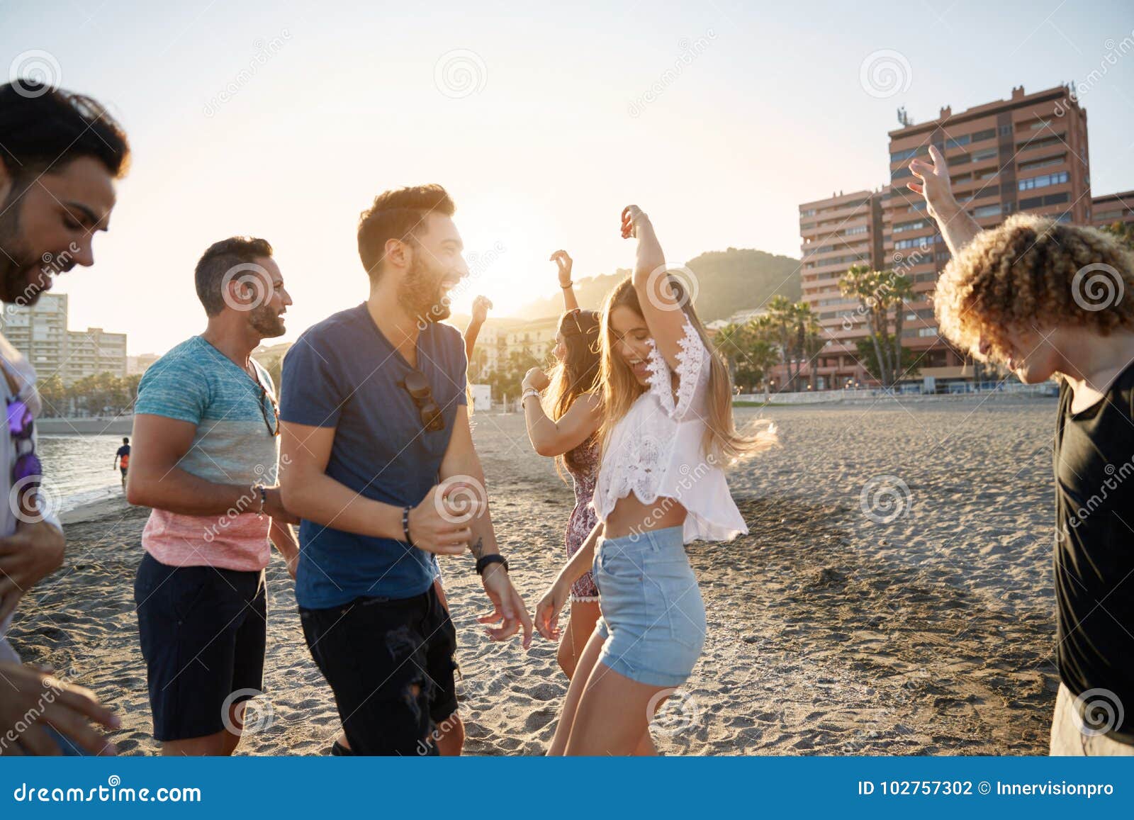 Young Happy People Dancing on Beach Stock Photo - Image of enthusiasm ...