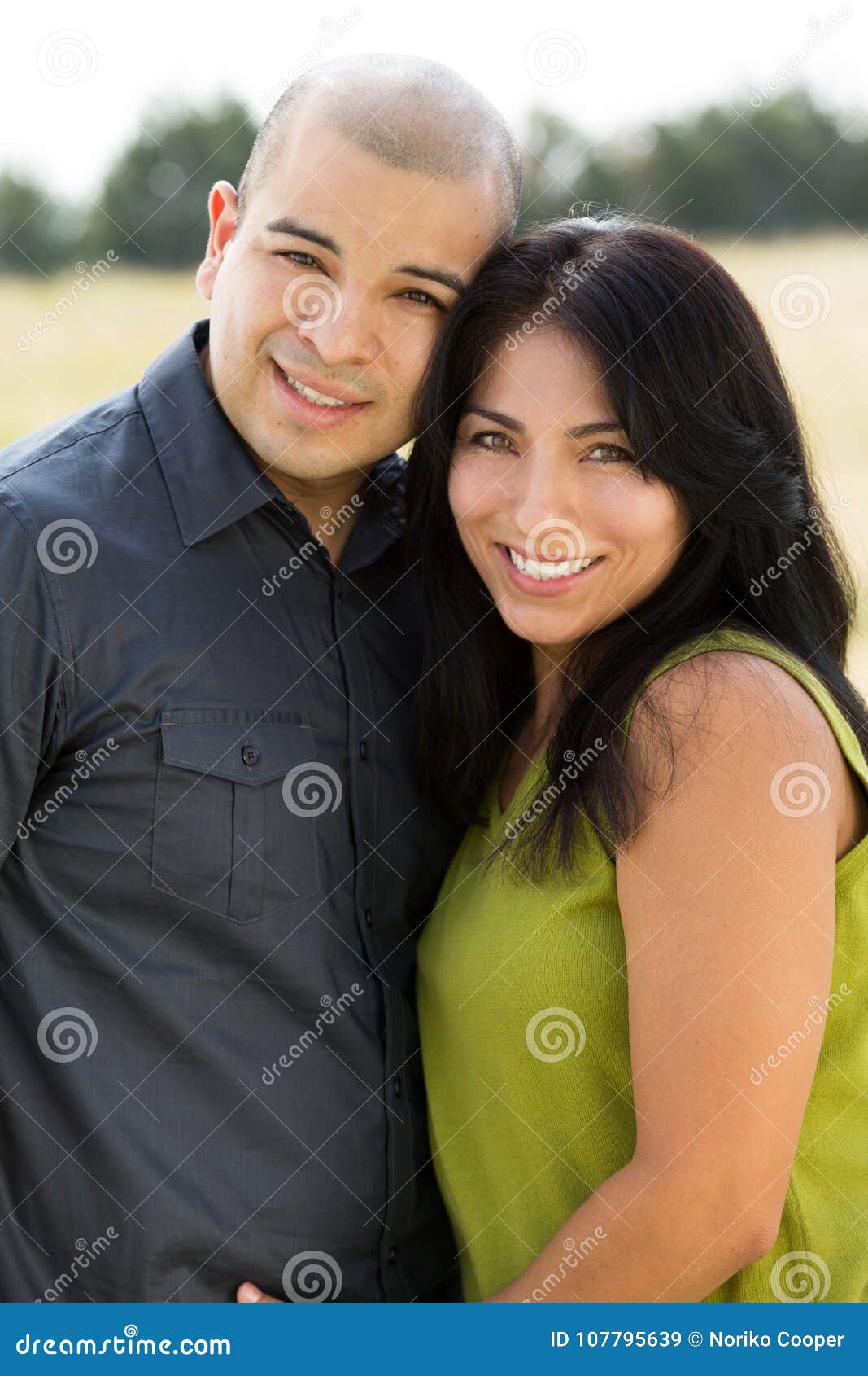 Young Hispanic Couple Smiling. Stock Image - Image of embracing ...