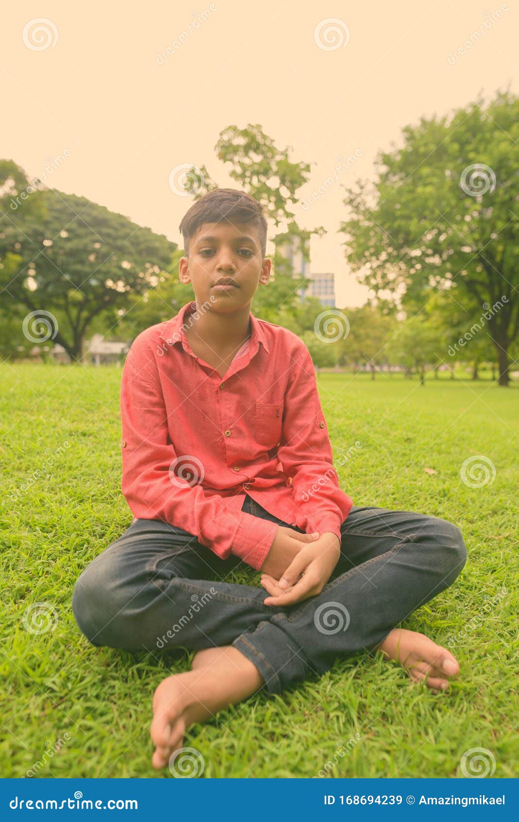 Portrait of Young Indian Boy Relaxing at the Park Stock Image - Image ... Portrait of Young Indian Boy Relaxing at the Park Stock Image - Image ...