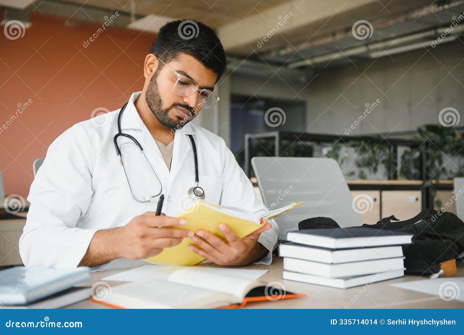 Portrait of a Young Indian Doctor Student Studying Stock Photo - Image ...