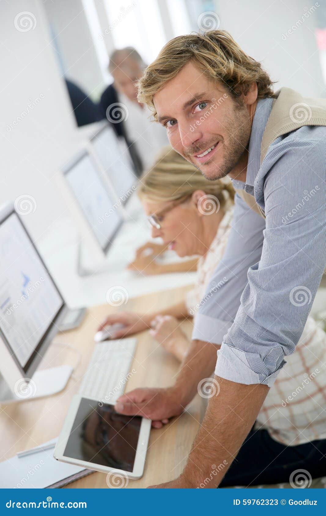 Portrait Of Young Instructor In Senior Business Class Stock Image ...