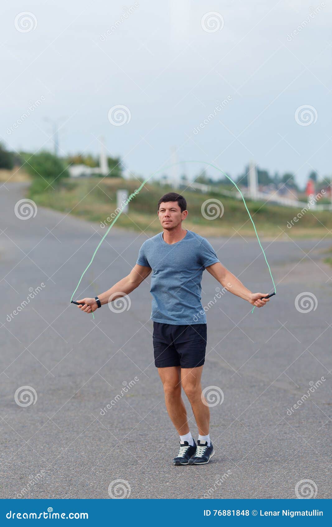Portrait of Young Male Athlete Skipping Rope Outdoors. Stock Photo ... Portrait of Young Male Athlete Skipping Rope Outdoors. Stock Photo ...