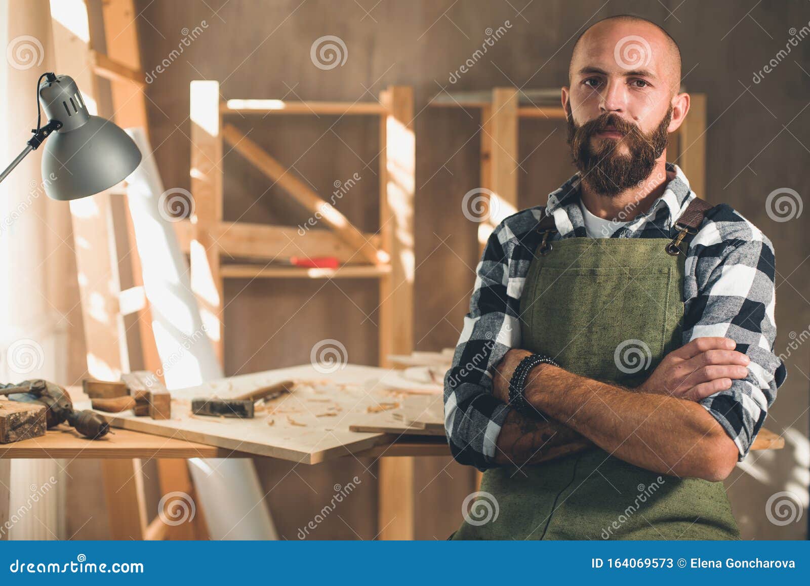 Portrait of a Young Male Carpenter Who Works in His Workshop. Stock ...