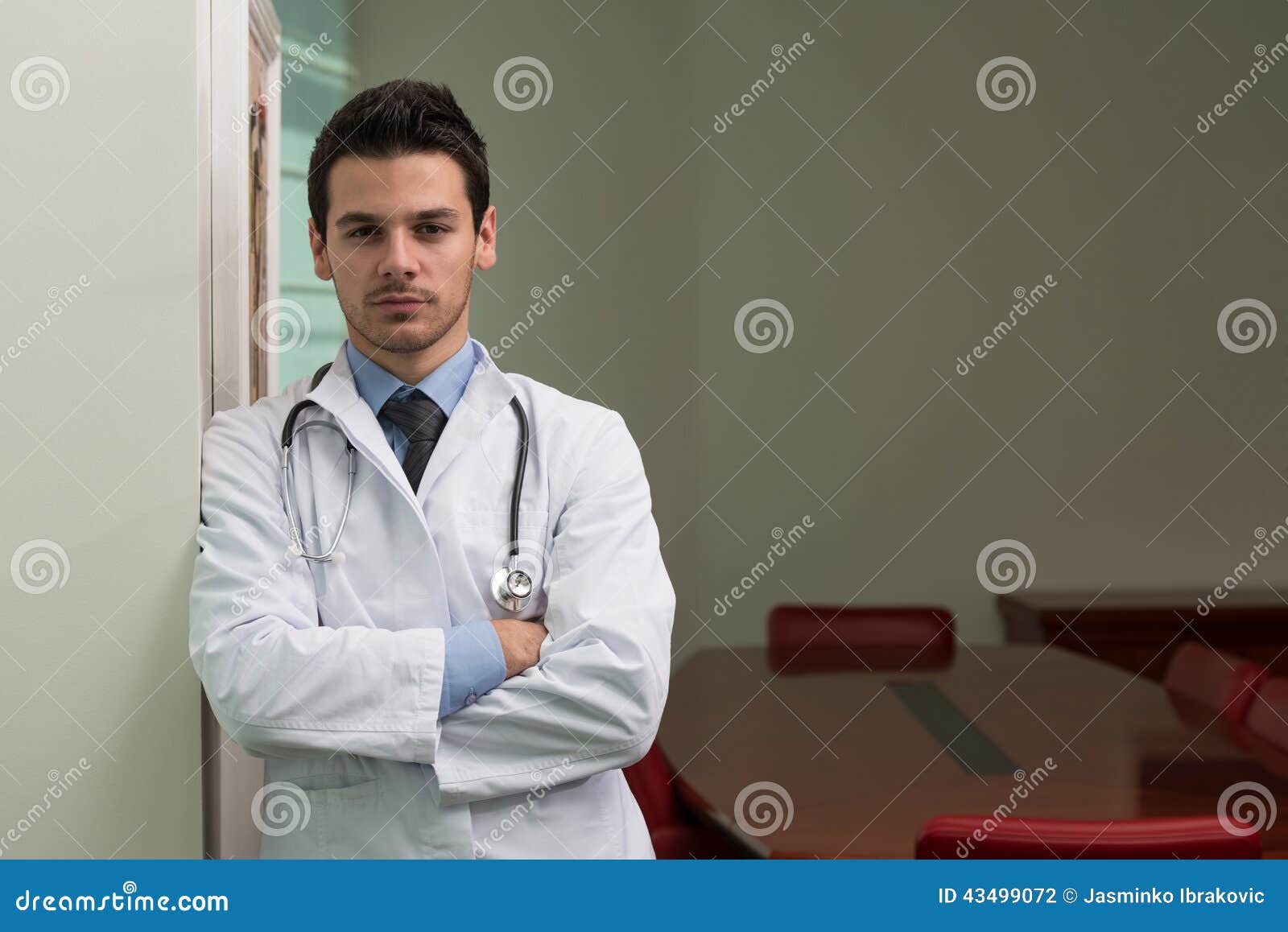 Portrait of Young Male Doctor Stock Photo - Image of doctor, blue: 43499072