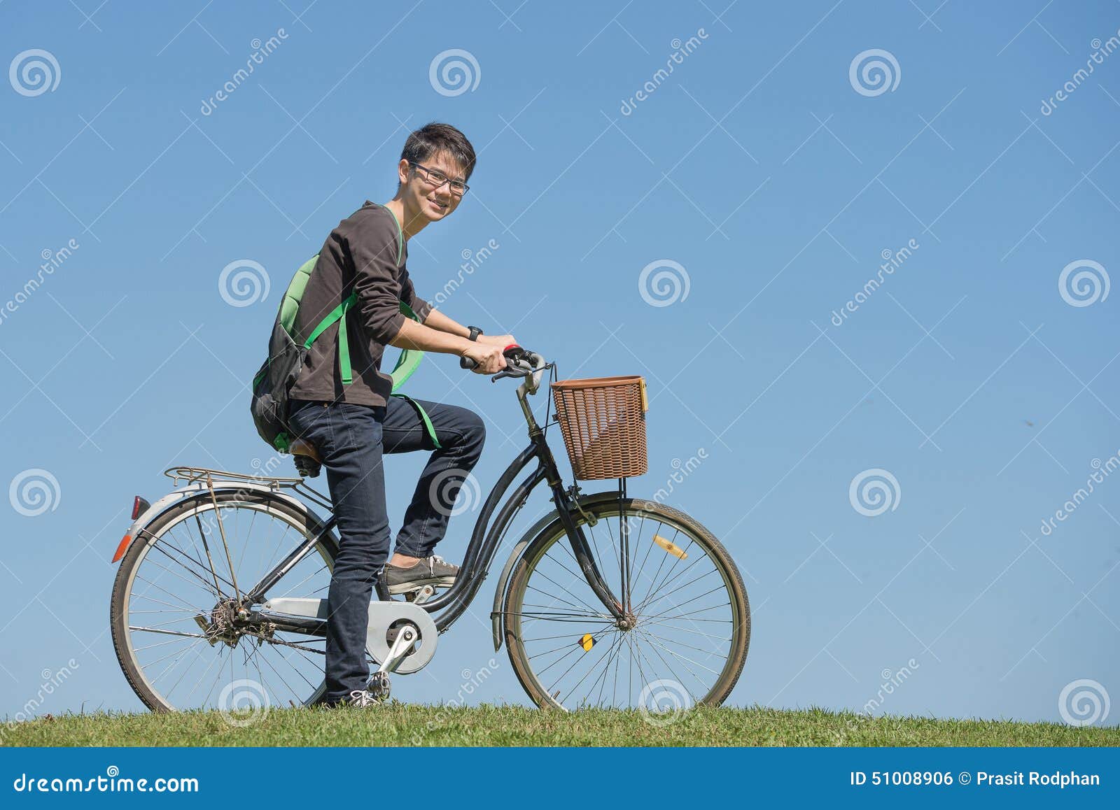 Portrait of Young Male Student with a Bicycle in Park Stock Photo ...