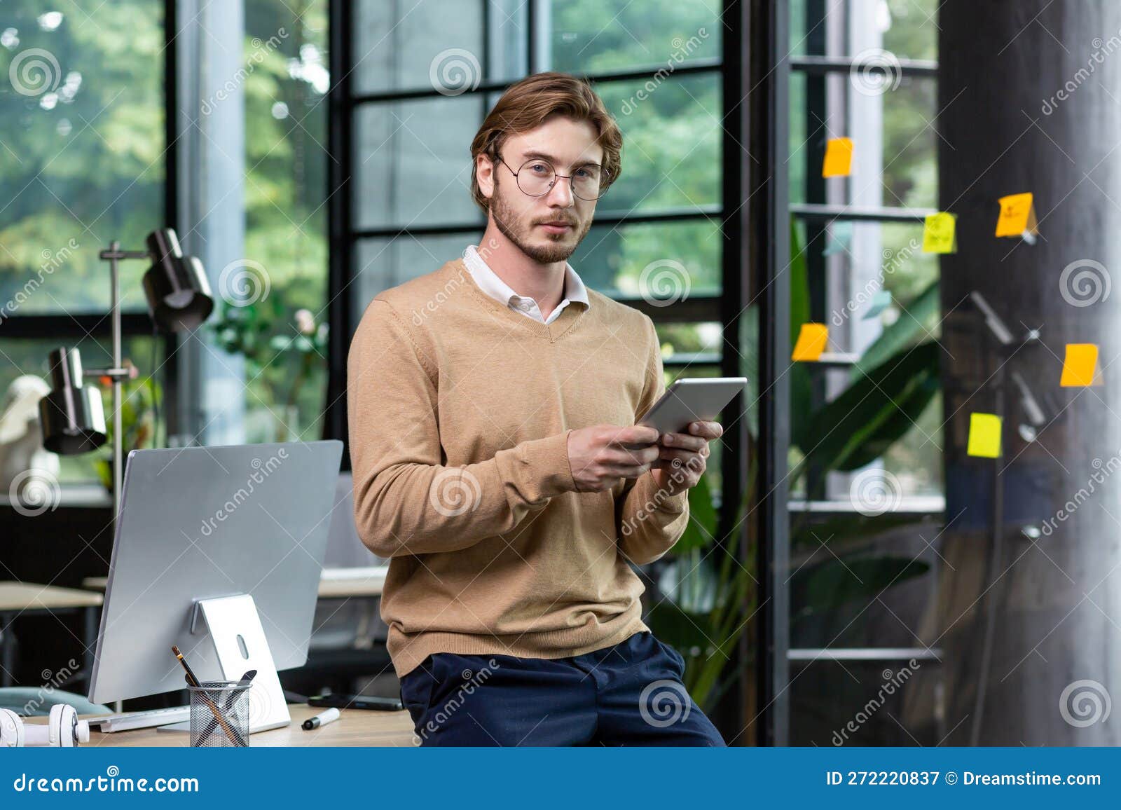 Portrait of a Young Male Student, Intern Standing in the Office, Co ...