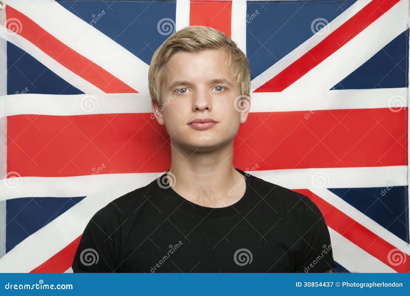 Portrait of Young Man Against British Flag Stock Image - Image of ...