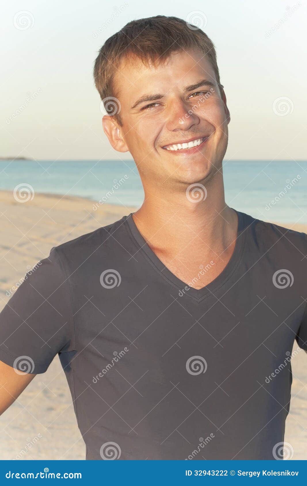 Portrait of a Young Man on the Beach Stock Photo - Image of coast ...