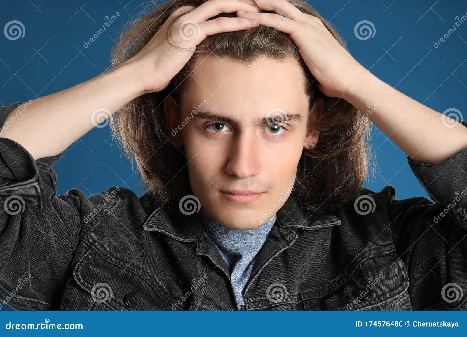 Portrait of Young Man on Blue Background Stock Photo - Image of black ...