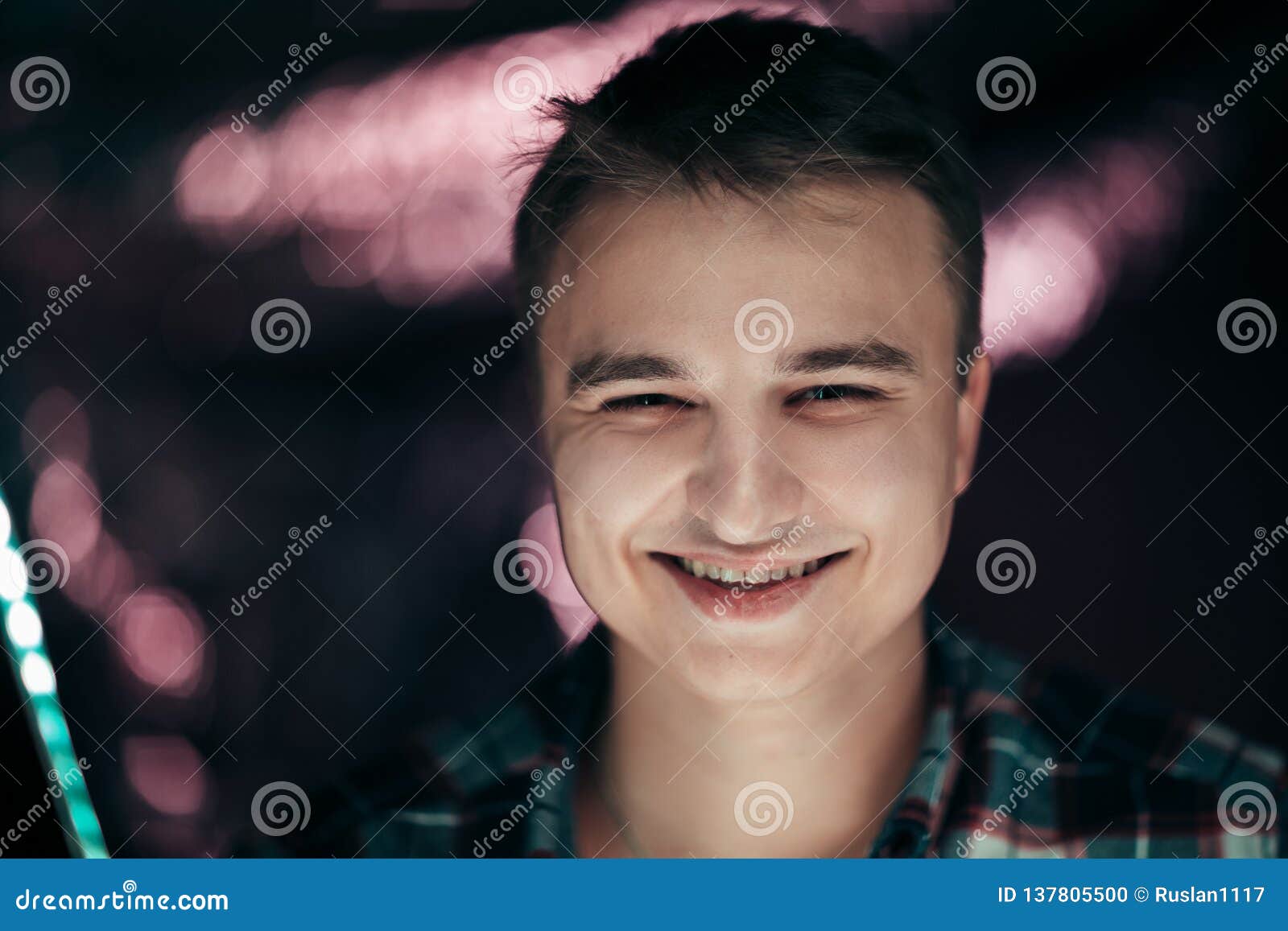 Portrait of a Young Man on a Blurred Background Stock Photo - Image of ...