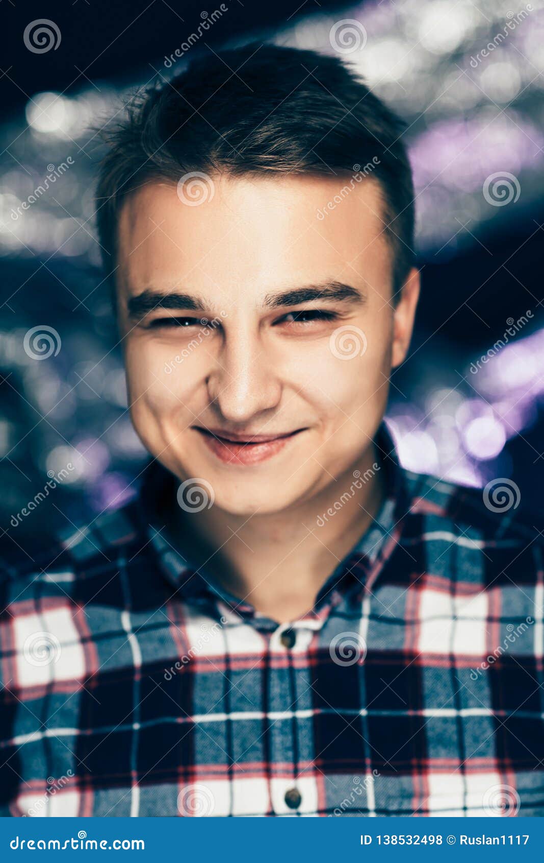 Portrait of a Young Man on a Blurred Background Stock Photo - Image of ...