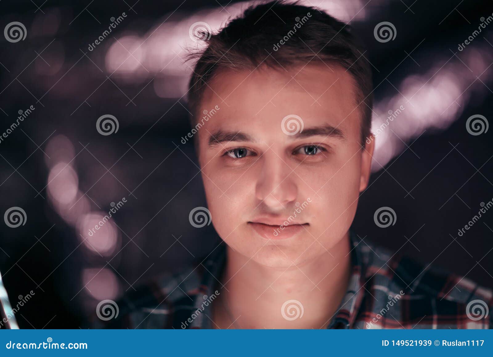 Portrait of a Young Man on a Blurred Background Stock Image - Image of ...