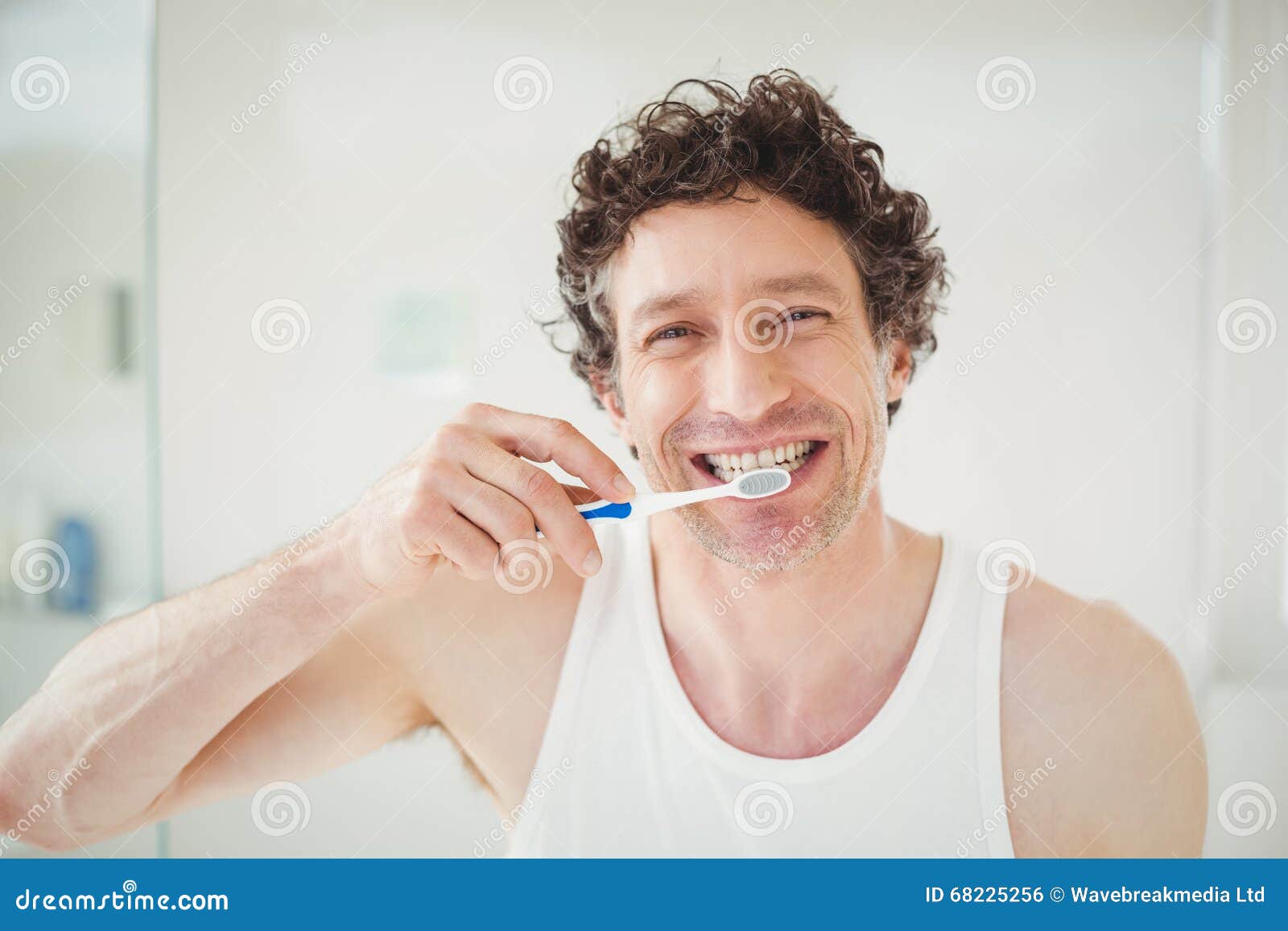 Portrait of Young Man Brushing Teeth Stock Photo - Image of house ...
