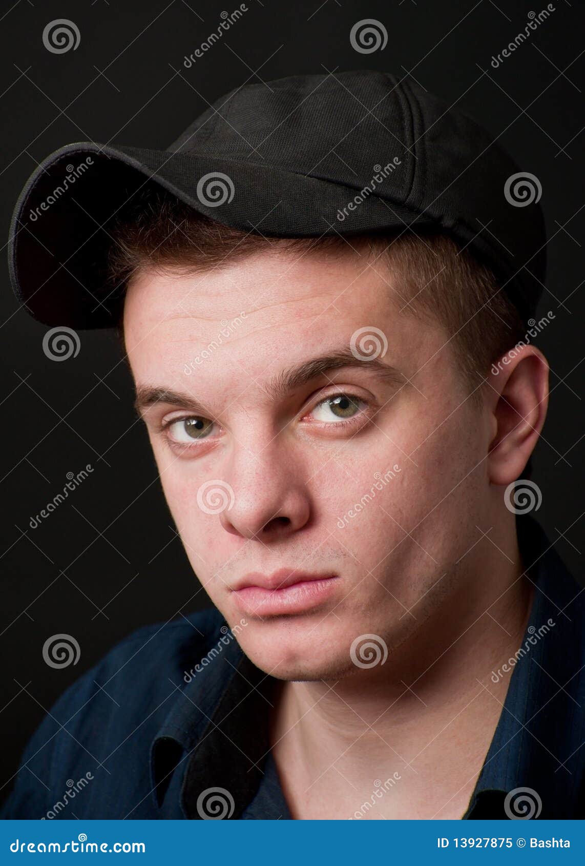 Portrait young man in cap stock image. Image of male - 13927875