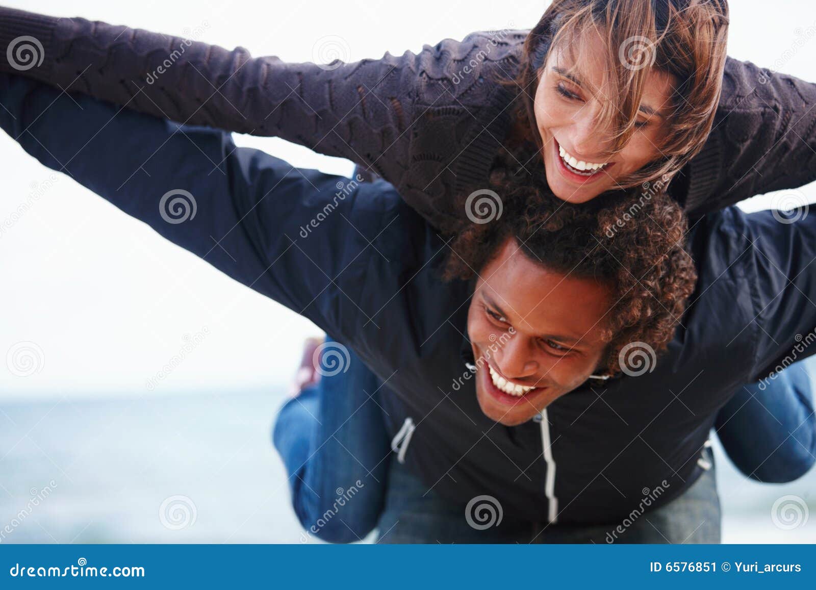 Portrait of a Young Man Carrying His Girlfriend Stock Image - Image of ...
