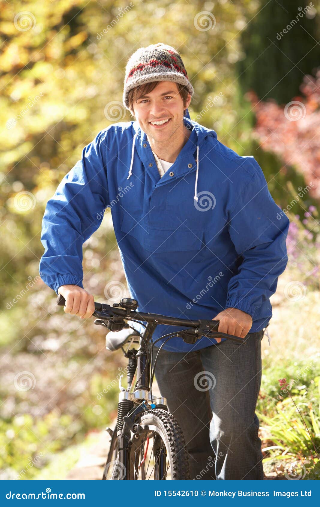 Portrait of Young Man with Cycle in Autumn Park Stock Photo - Image of ...