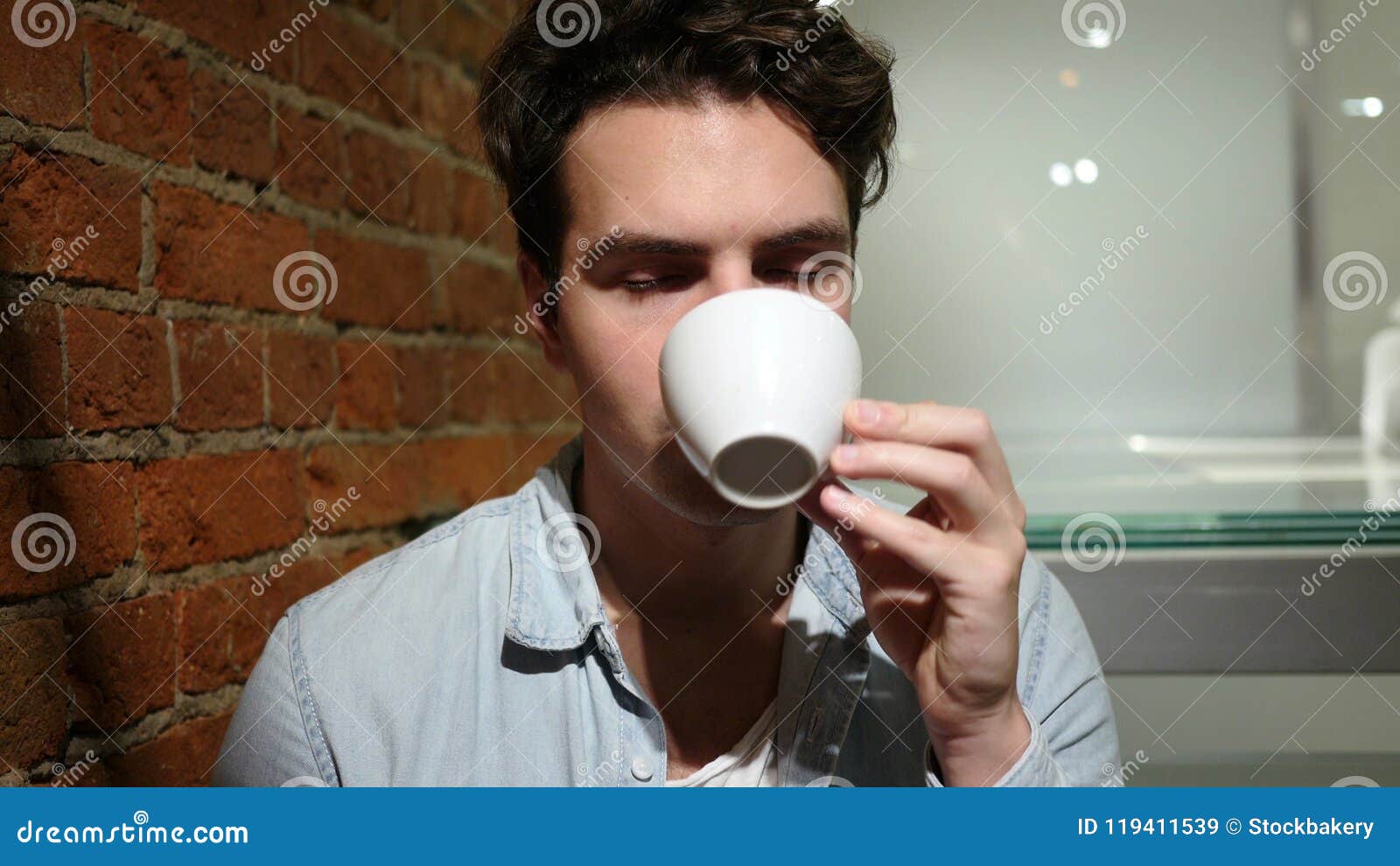 Portrait of Young Man Drinking Coffee from Cup Stock Image - Image of ... Portrait of Young Man Drinking Coffee from Cup Stock Image - Image of ...