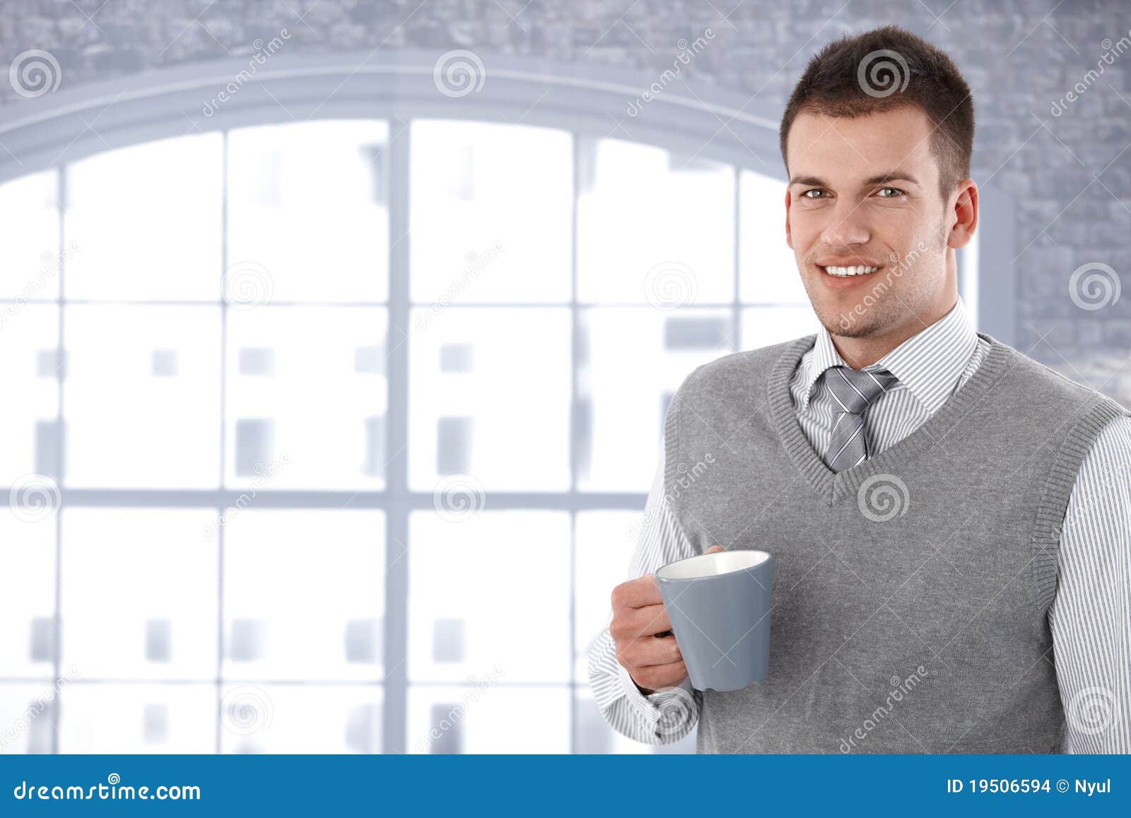 Portrait of Young Man Drinking Tea Smiling Stock Photo - Image of ...