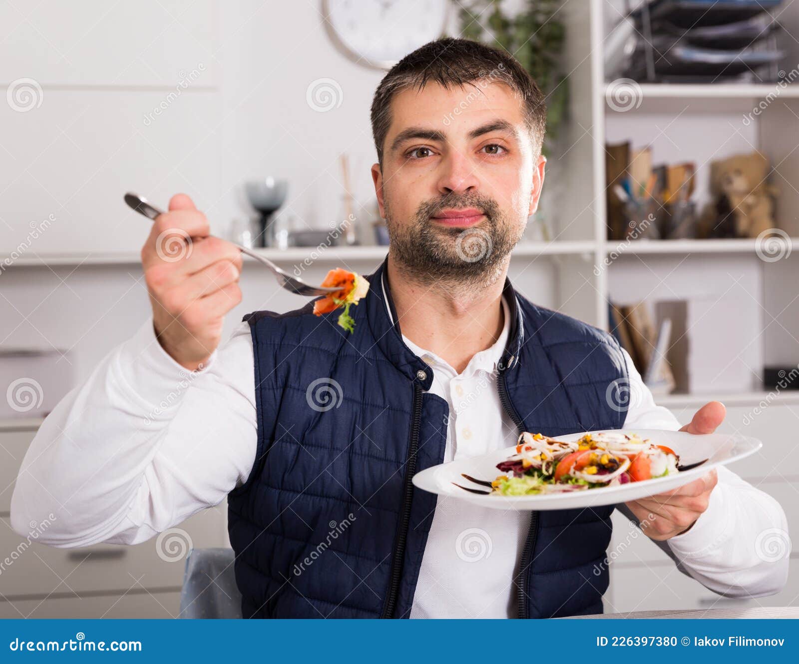 Portrait of Young Man Eating Vegetable Salad Stock Photo - Image of ...
