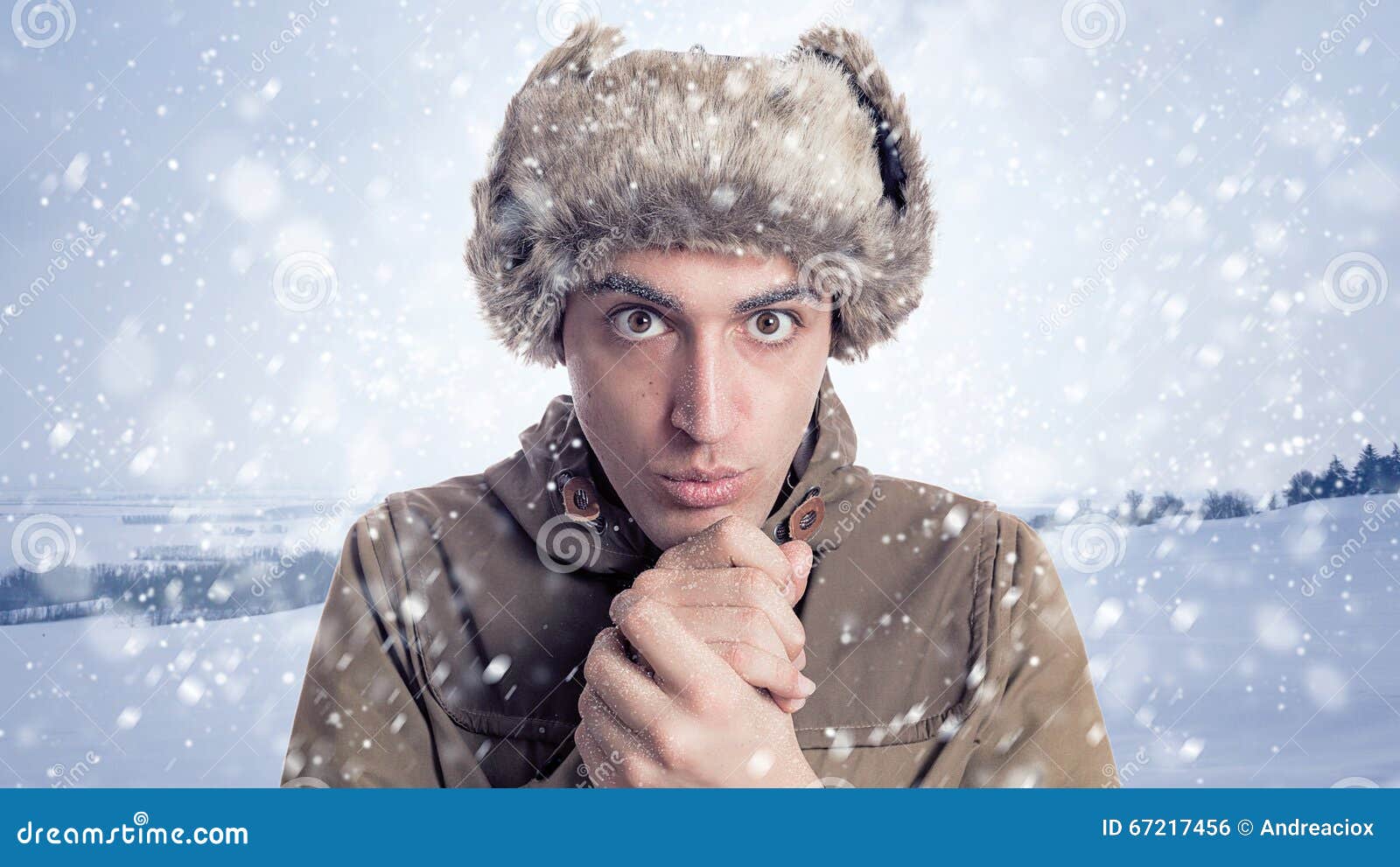 Portrait of Young Man with Eskimo Hat and Winter Background Stock Photo ...