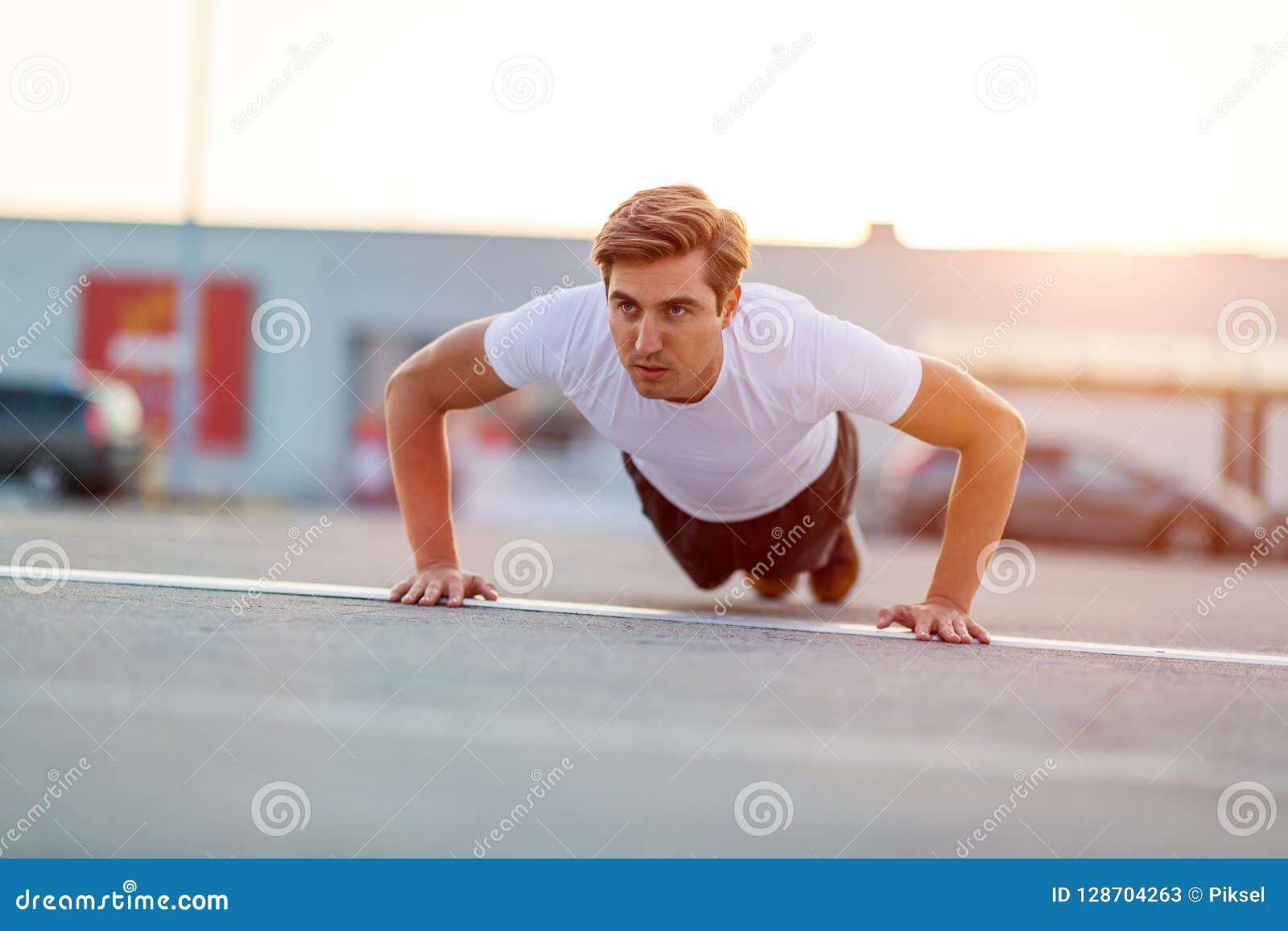 Young Man Exercising Outdoors Stock Image - Image of exercising ...