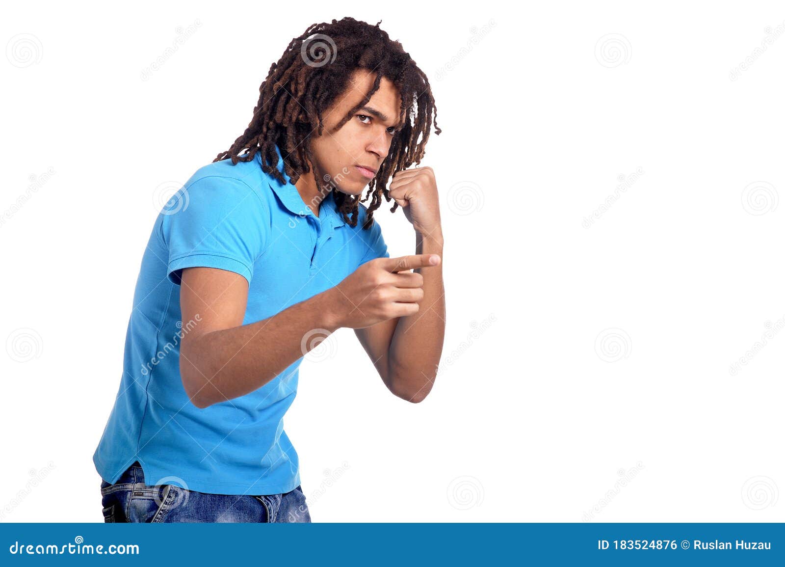 Portrait of Young Man Fighting Against White Background Stock Photo ...