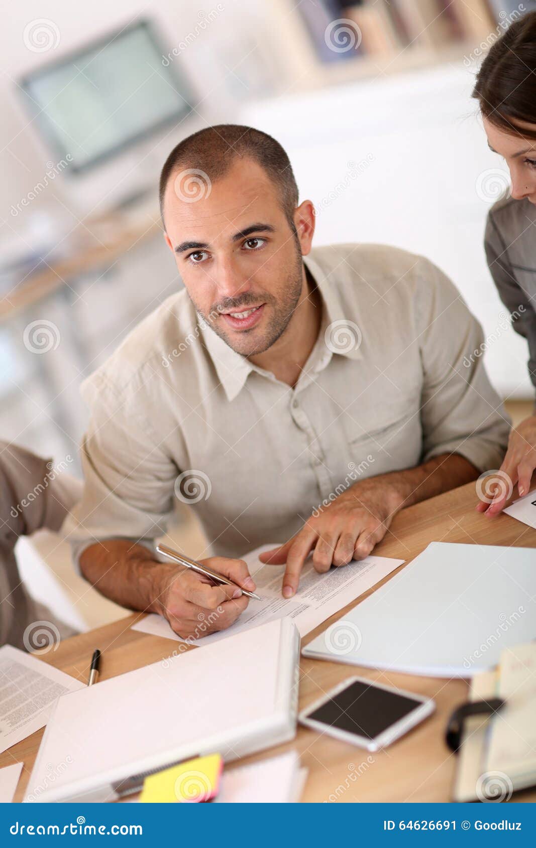 Portrait of Young Man Filling Form Stock Image - Image of motivated ...