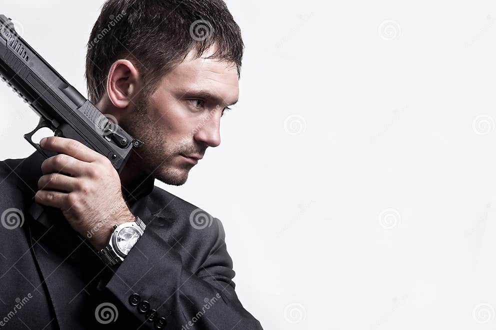 Portrait of Young Man with Gun Stock Photo - Image of adult, person ...