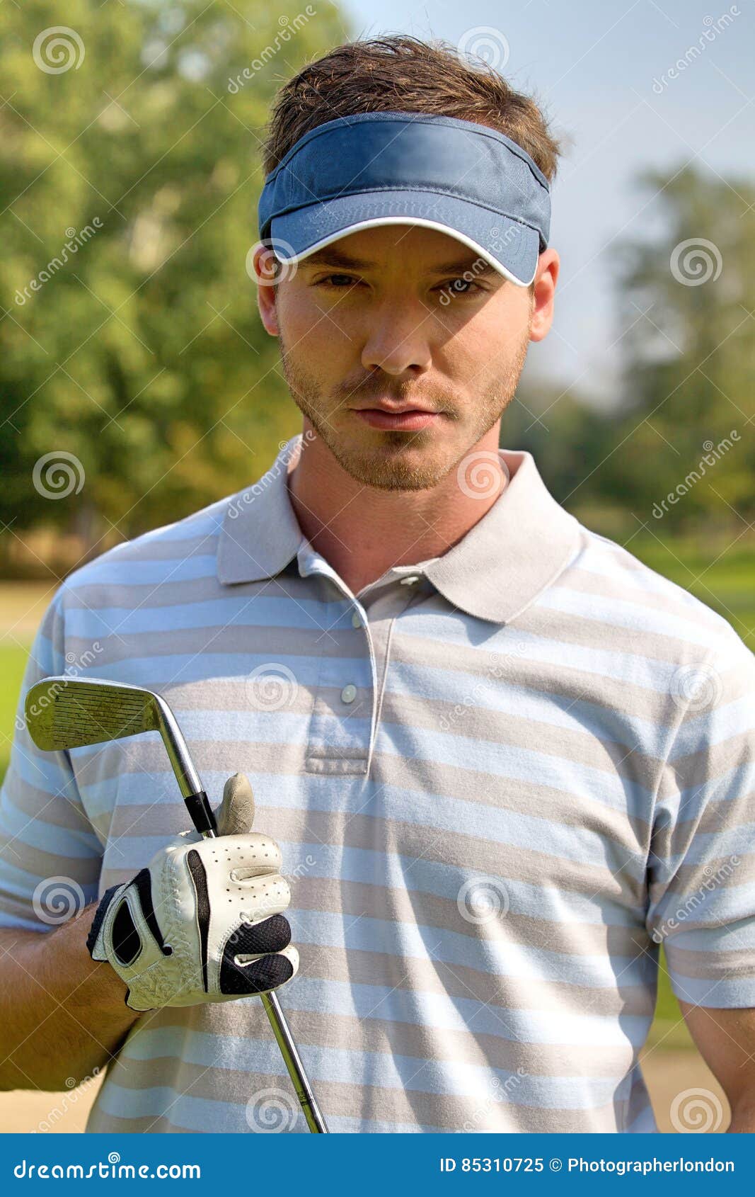 Portrait of Young Man Holding Golf Stick Stock Image - Image of ...