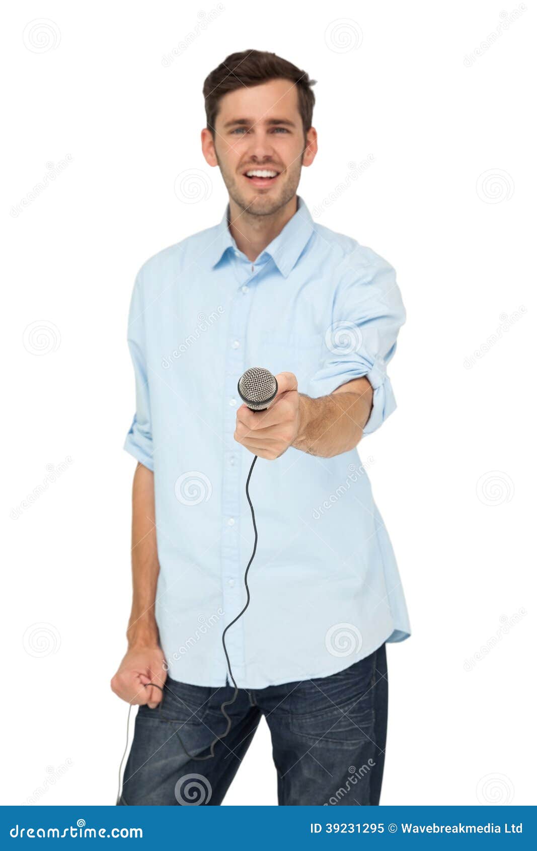 Portrait of a Young Man Holding Out Microphone Stock Image - Image of ...