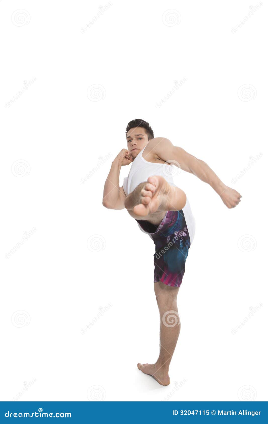 Portrait of Young Man Kicking Stock Image - Image of handsome, angry ...