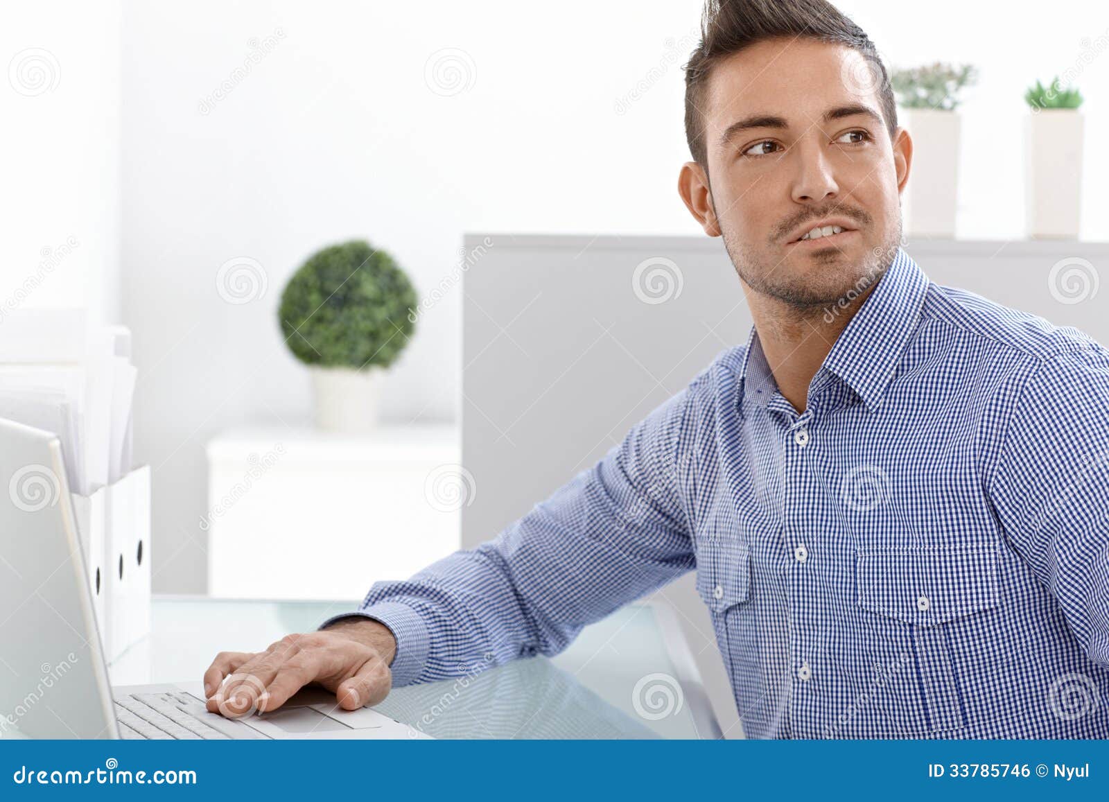 Portrait of Young Man with Laptop Stock Photo - Image of indoor ...