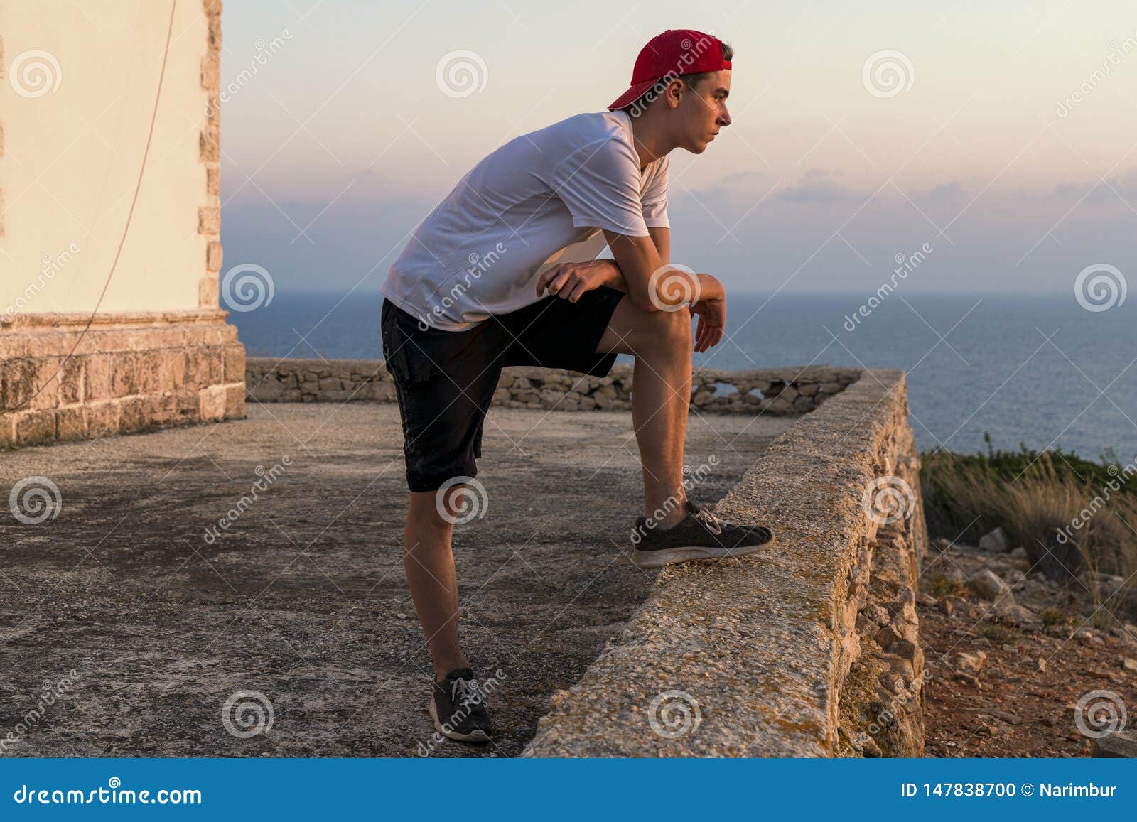 Young Man, Looking at the Sunset Stock Photo - Image of male, casual ...