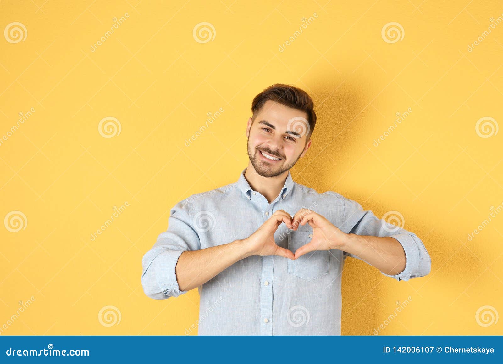 Portrait of Young Man Making Heart with His Hands Stock Image - Image ...